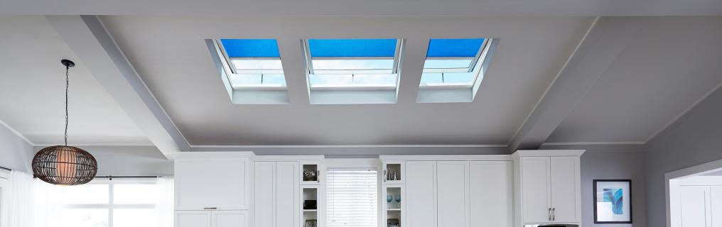 HOMEOWNERS SAVE NOW AND LATER WITH VELUX SOLAR POWERED SKYLIGHTS AND BLINDS